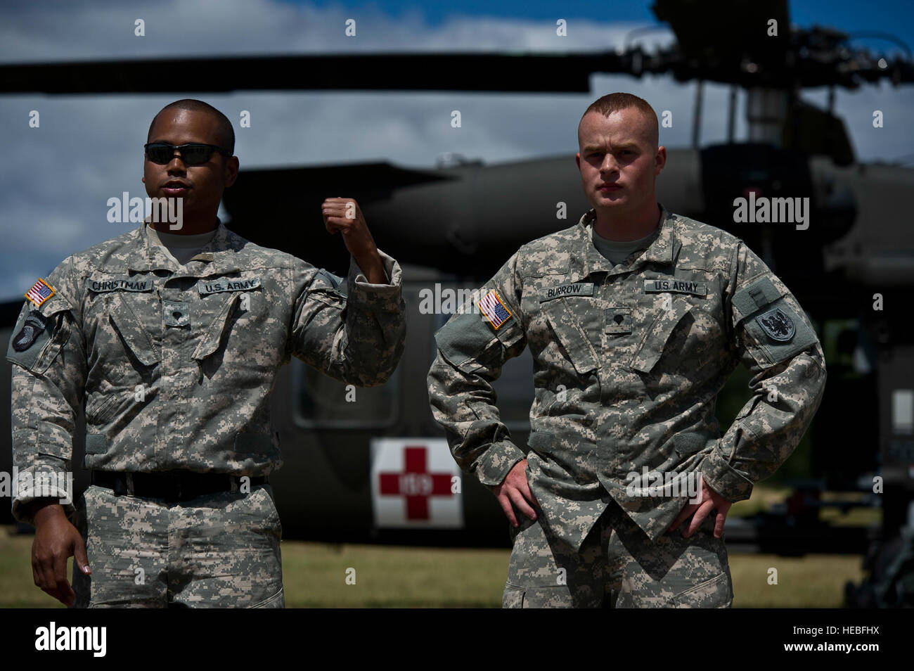 U.S. Army Specialist Marbou Teddy Christman, left, and Specialist Evan ...
