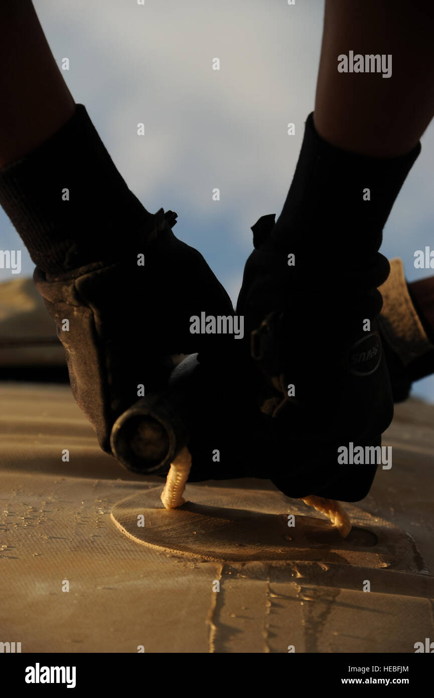 A U.S. Army soldier, from the 302nd Quartermaster Company, 9th Mission ...