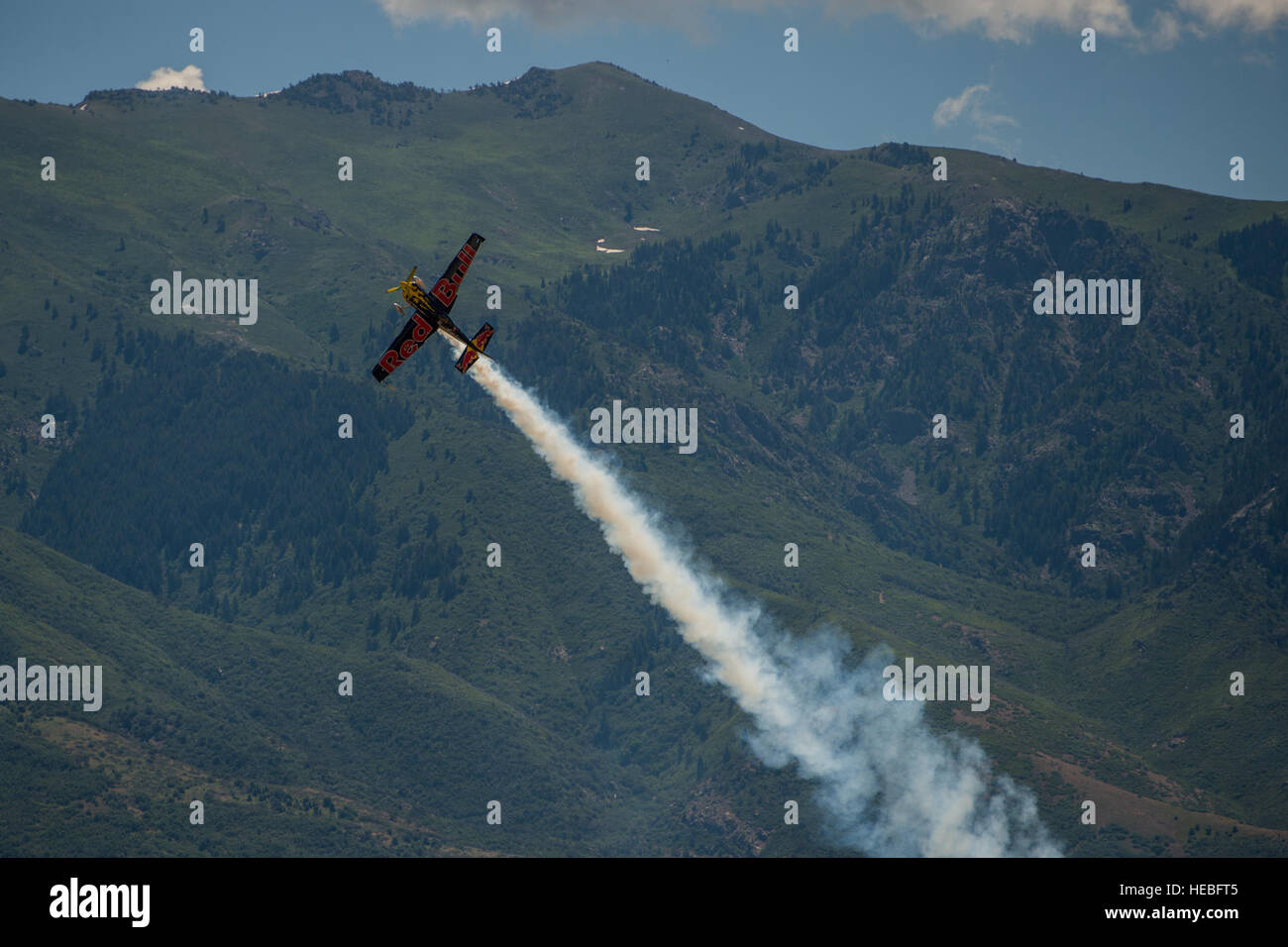 A Red Bull stunt plane performs maneuvers during the Warriors Over the ...