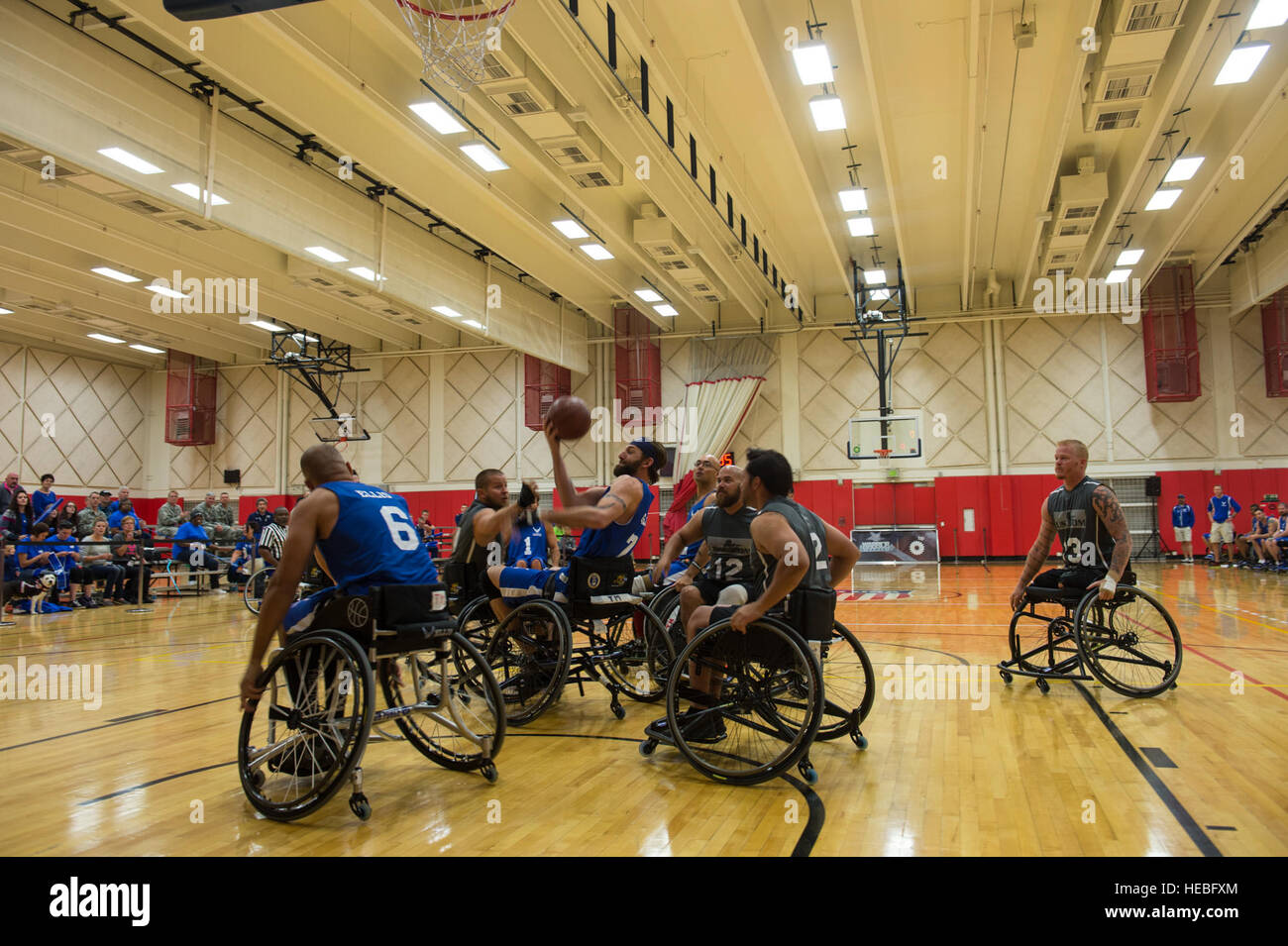 U.S. Air Force athlete Ryan Gallo fights for a rebound in the first ...