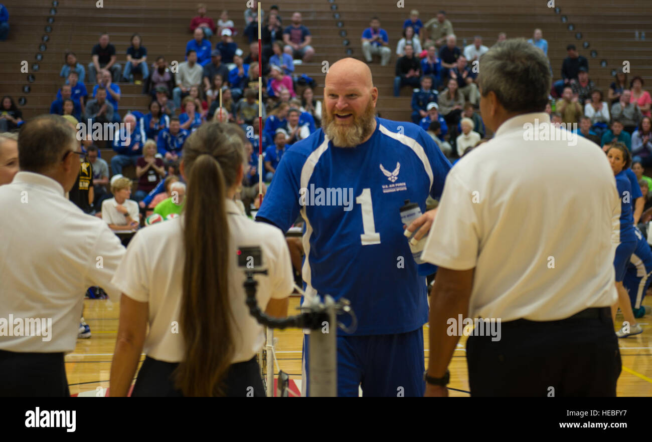 U.S. Air Force athlete Keith Sekora shakes hands with the officials ...