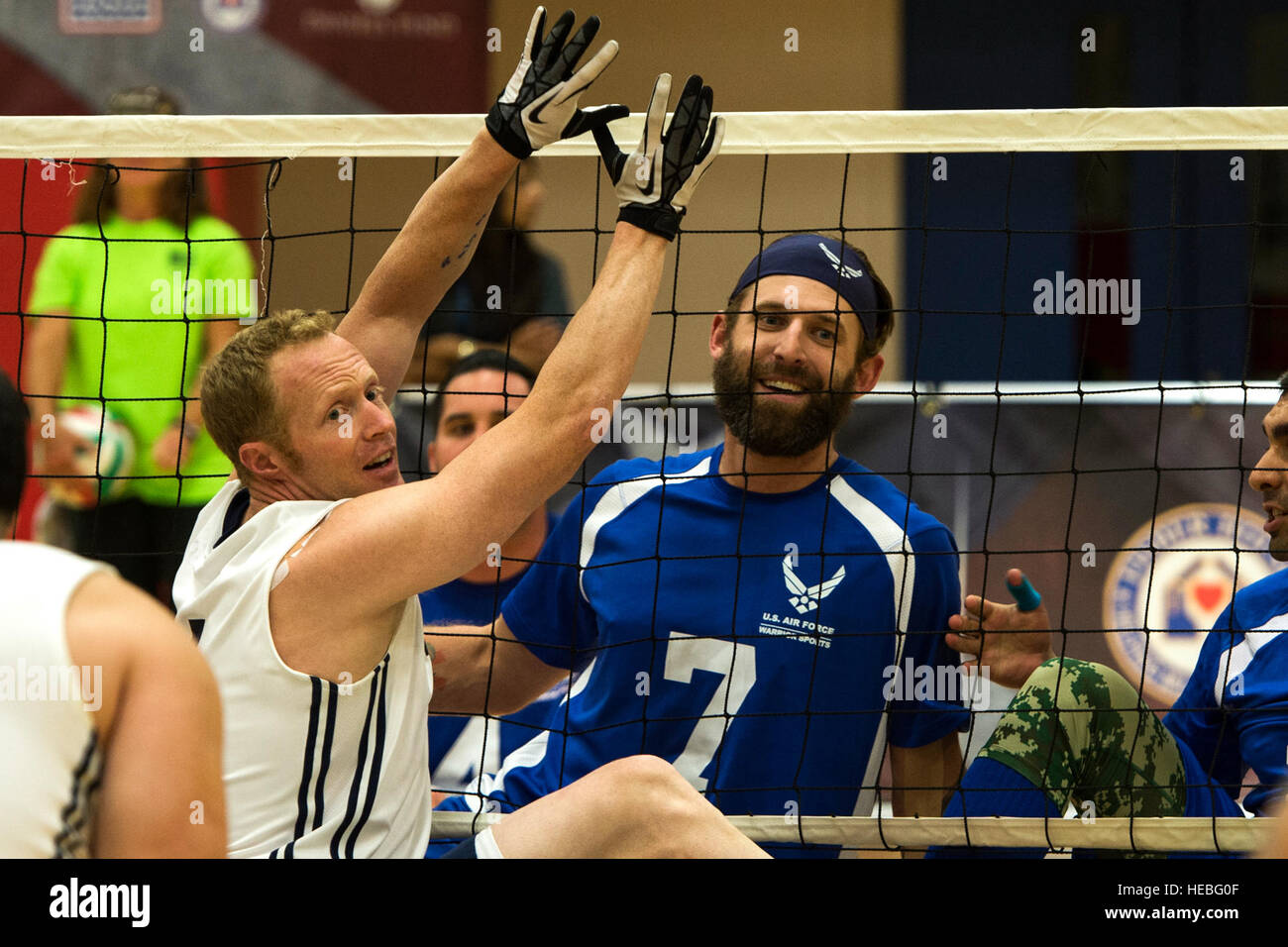 U.S. Air Force athlete Ryan Gallo participates in a sitting volleyball ...