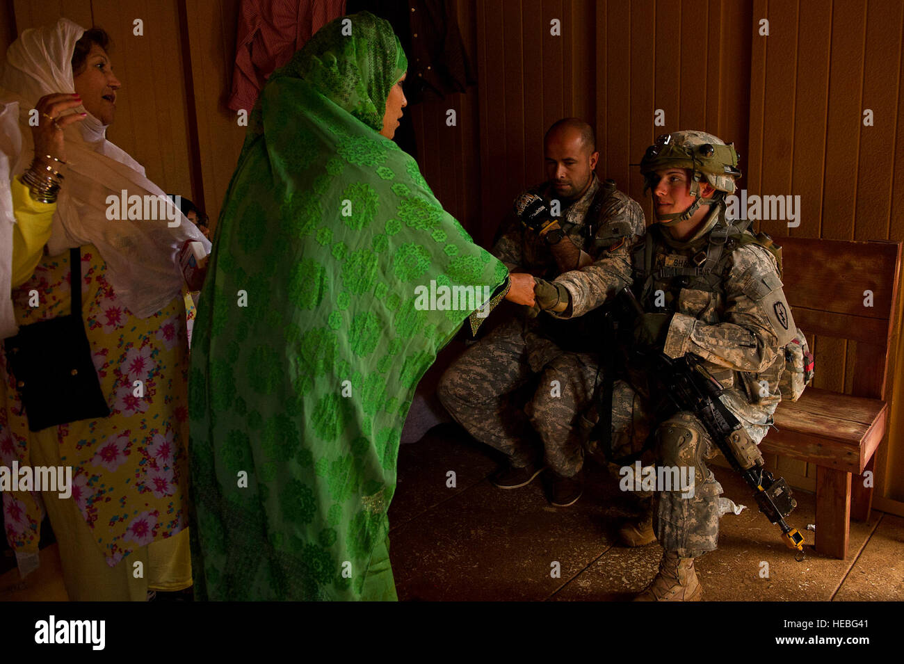 U.S. Army Female Engagement Team members conduct operations in a mock ...