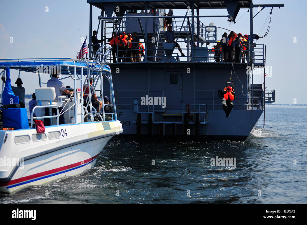 A U.S. Air Force student is dropped into the ocean during the Water ...