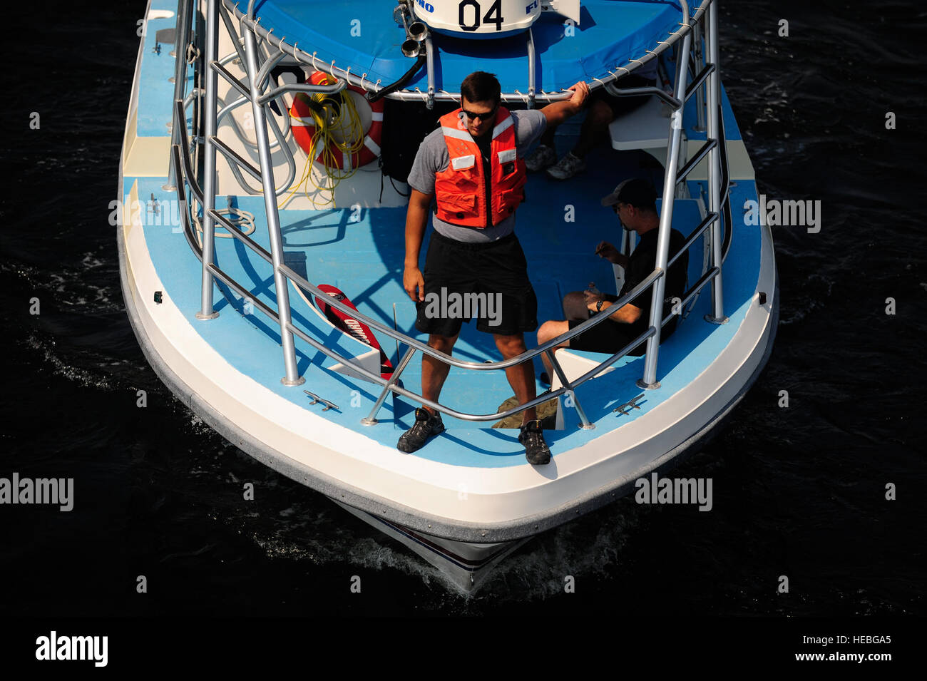 A U.S. Air Force safety boat patrols the waters in the Pensacola Bay to ...