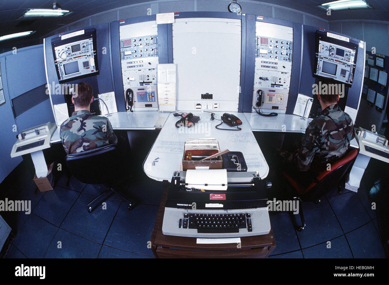 Airman 1st Class Charles W. Carlson, left, an Automatic Digital Network ...