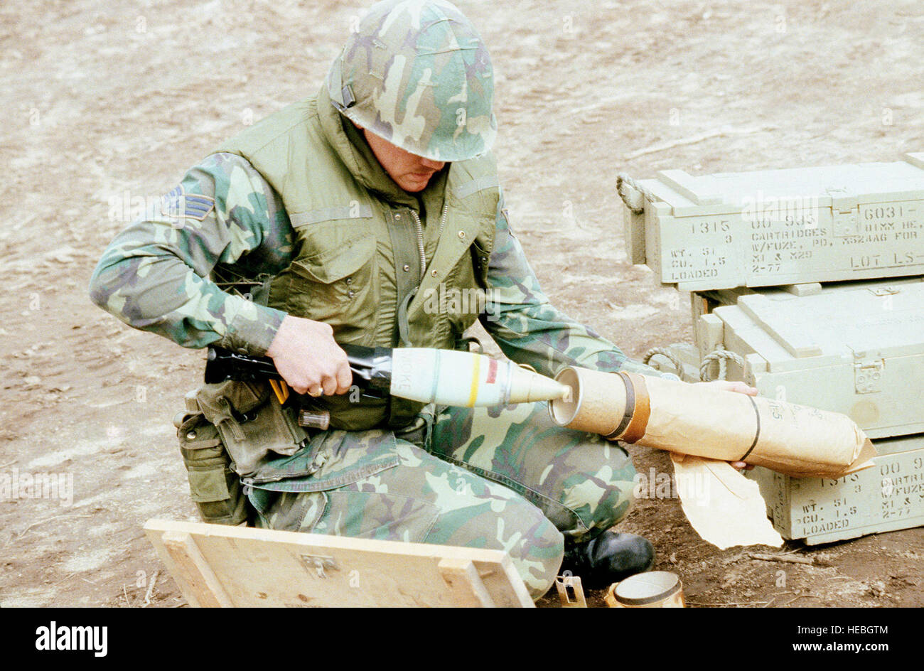 51st Security Police Squadron member SSGT Robert Colyer packs a white ...