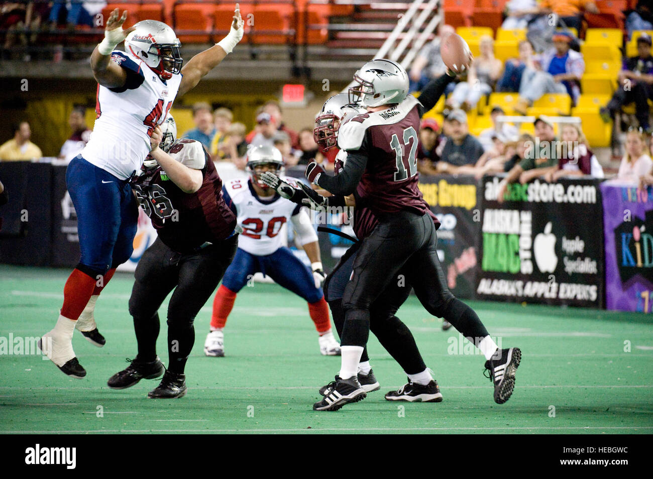 ANCHORAGE, Alaska—Staff Sgt. Earl Mason throws the football down the ...