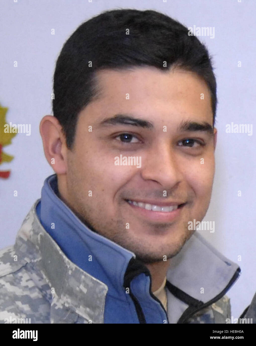 Army Spec. Jason Gutierrez poses for a photo with actor Wilmer ...