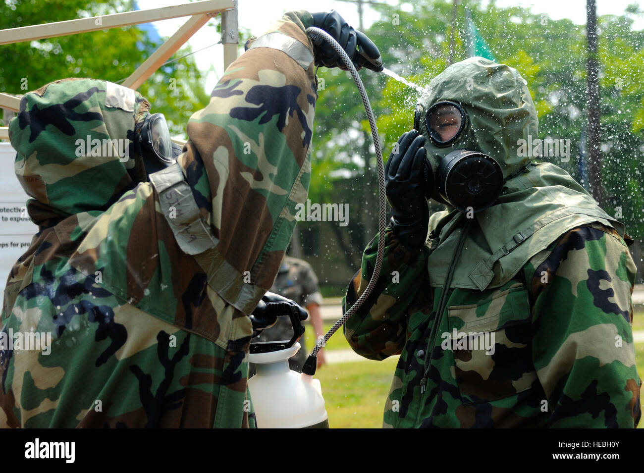 Staff Sgt. Shaun Renn assists an airman assigned to South KoreaÕs 38th ...