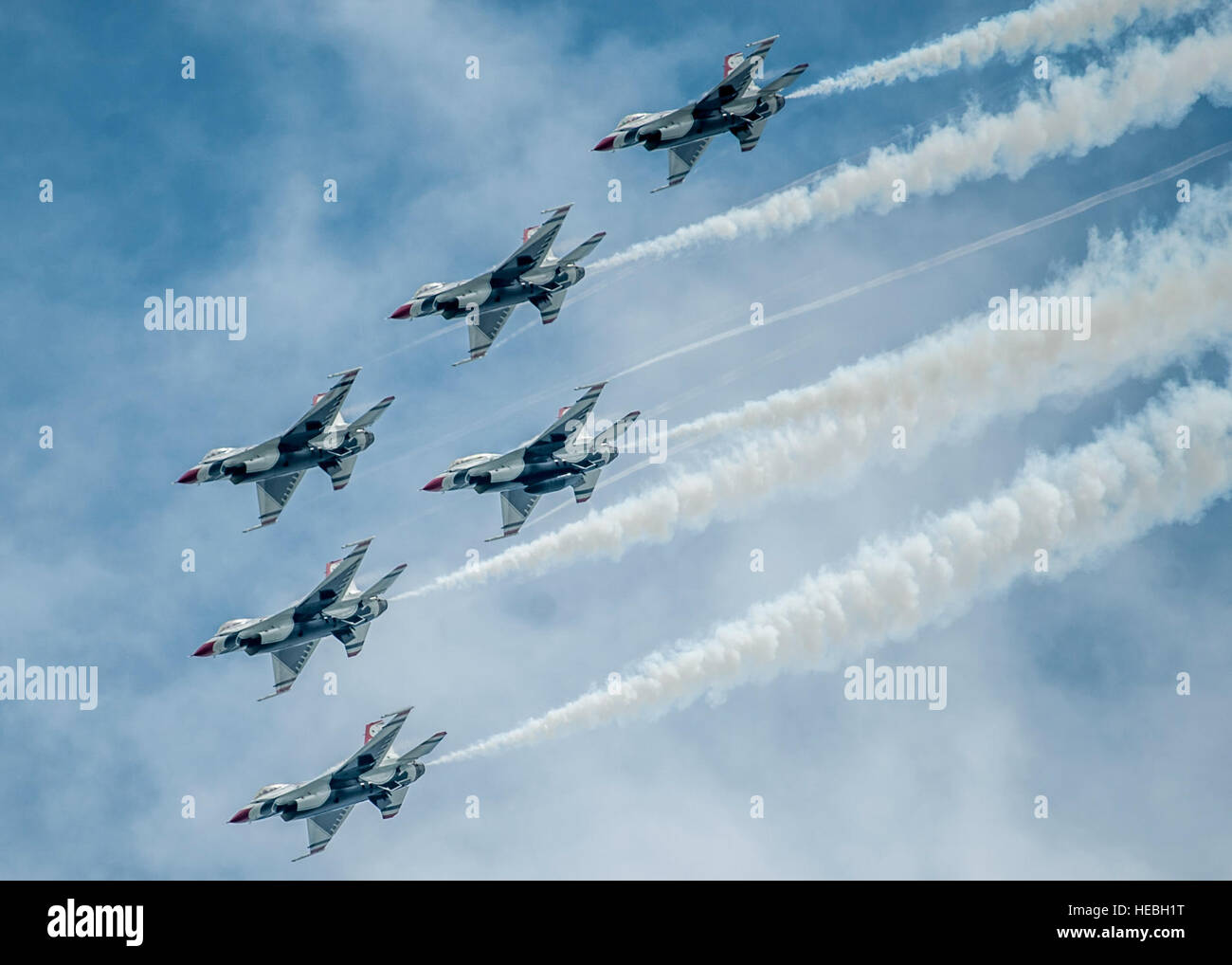 The Thunderbirds Delta formation performs the Delta Loop maneuver ...