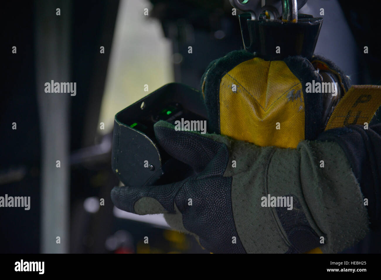 Staff Sgt. Chris, 36th Rescue Flight special mission aviator, holds the ...