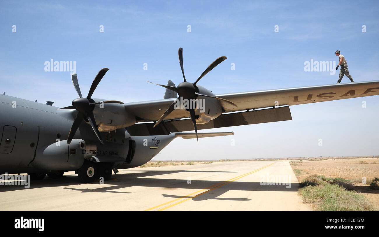 U.S. Air Force Senior Airman Beau Lewis, a crew chief with the 146th ...