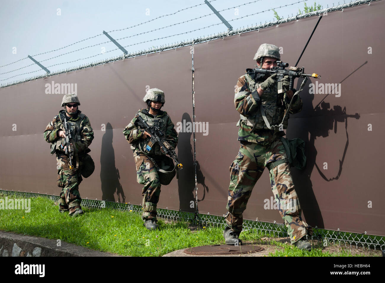 Airmen from the 8th Security Forces Squadron conduct perimeter security ...