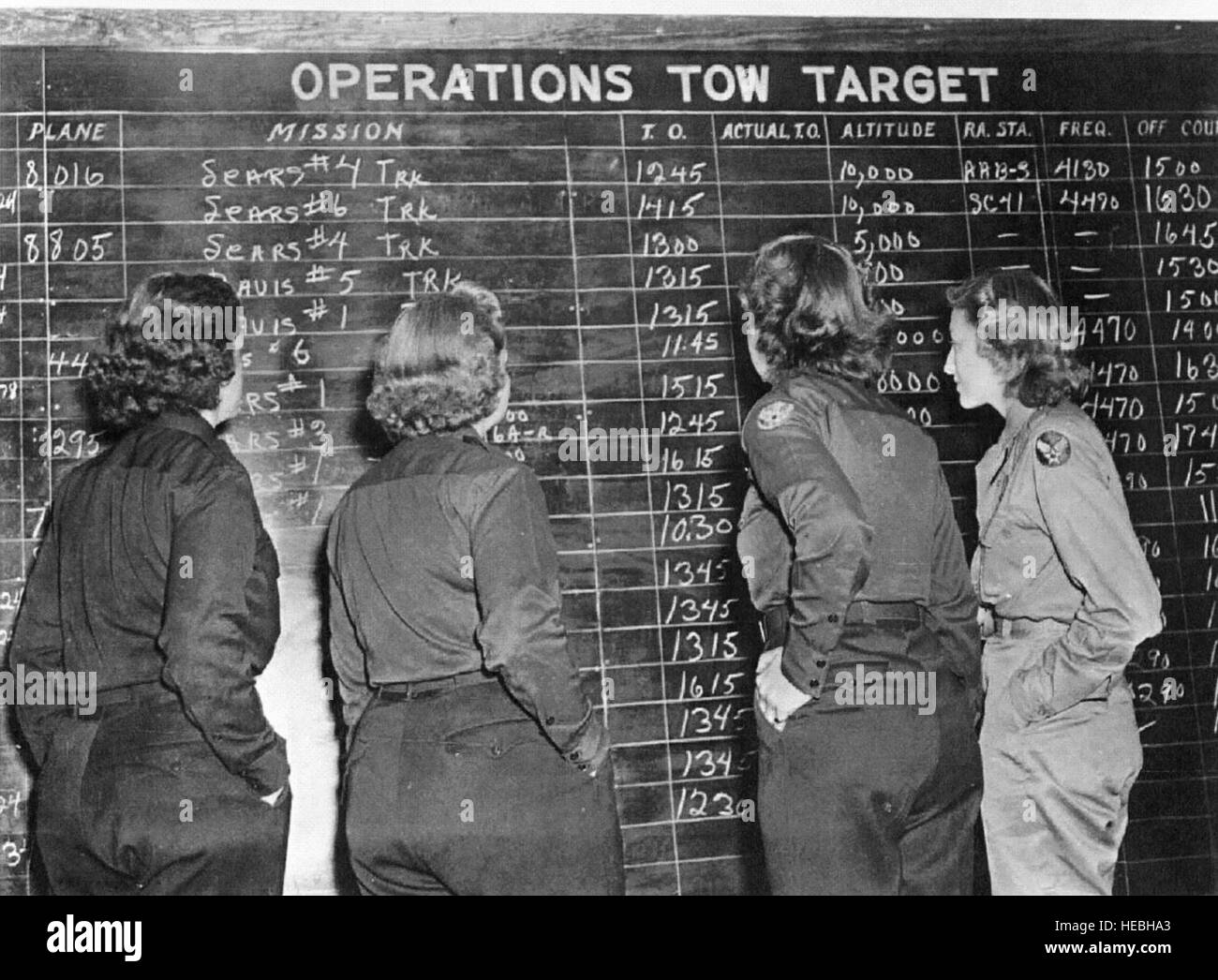 Womens Airforce Service Pilots check the tow schedule. (U.S. Air Force ...