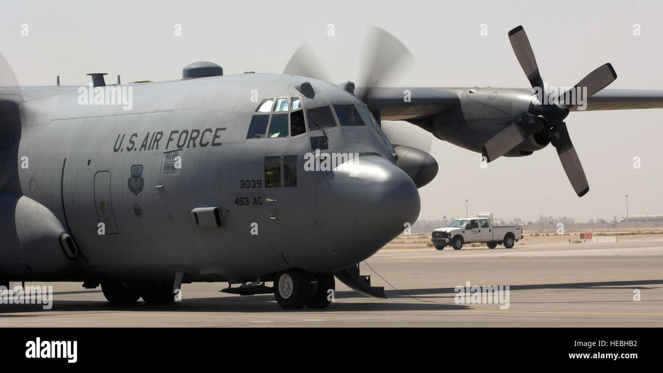 JOINT BASE BALAD, Iraq --A C-130 Hercules cargo aircraft starts up its ...
