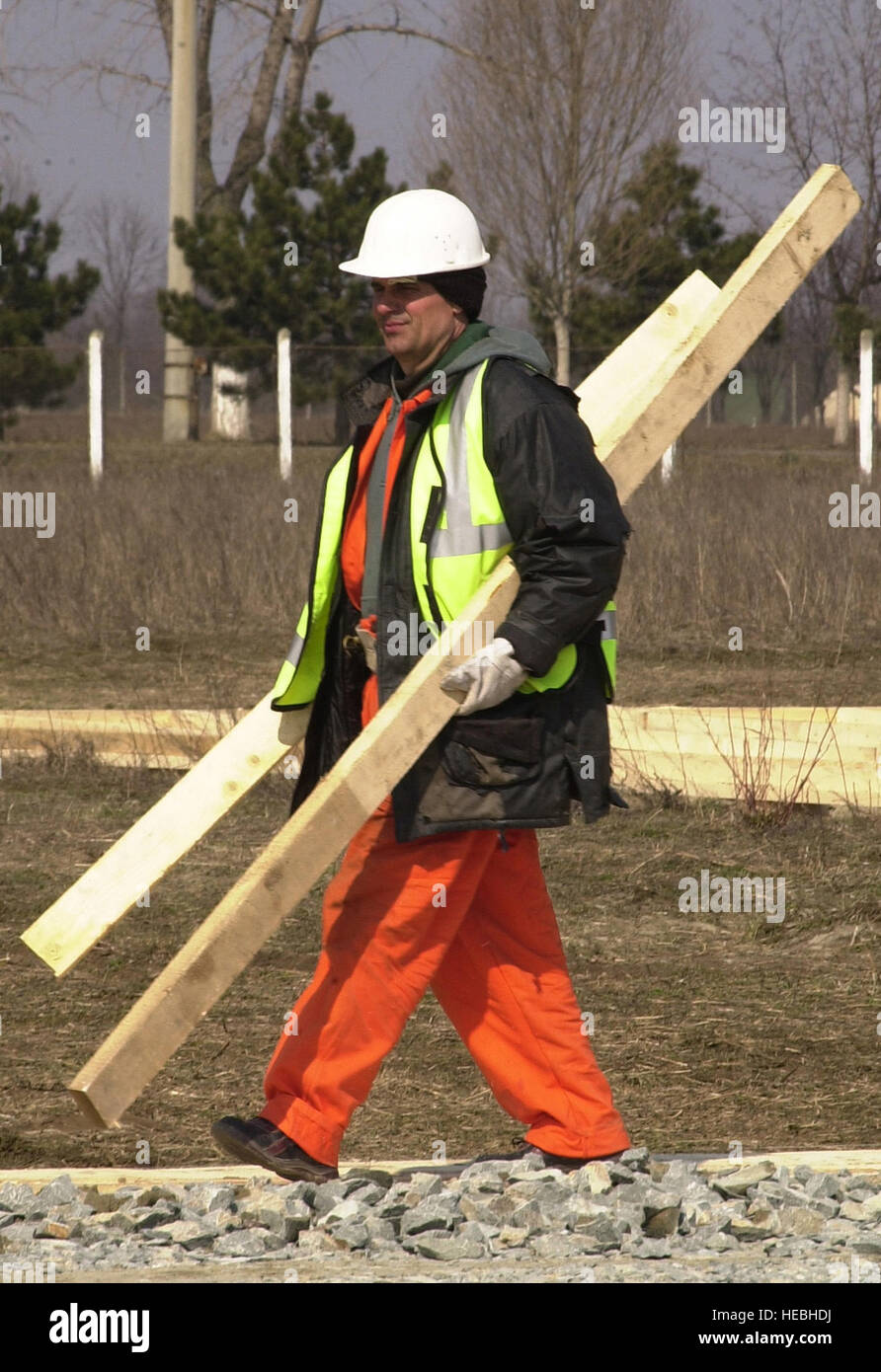 A civilian performs groundwork for a tactical airlift control element ...