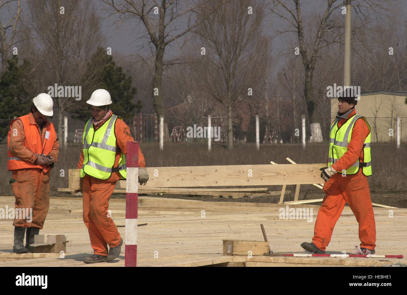 Civilians perform the groundwork for a tactical airlift control element ...