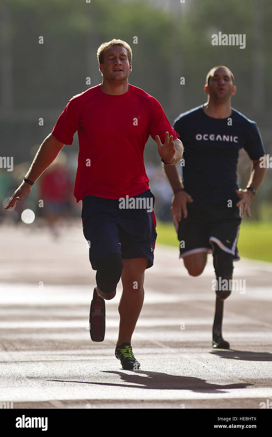 U.S. Navy Petty Officer 2nd Class Max Rohn and Petty Officer 3rd Class ...