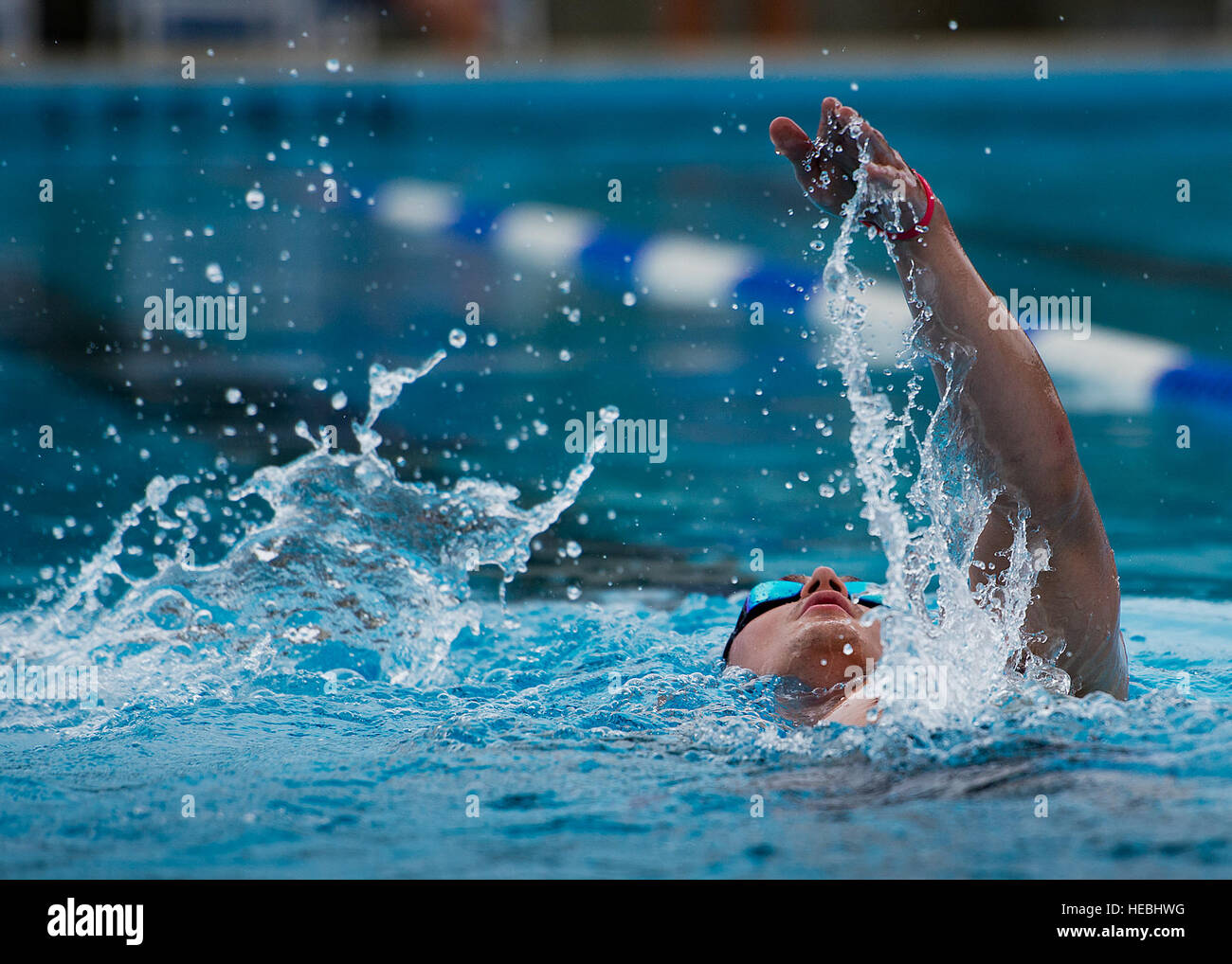 Timothy Babb, an Air Force Wounded Warrior athlete, backstrokes during ...