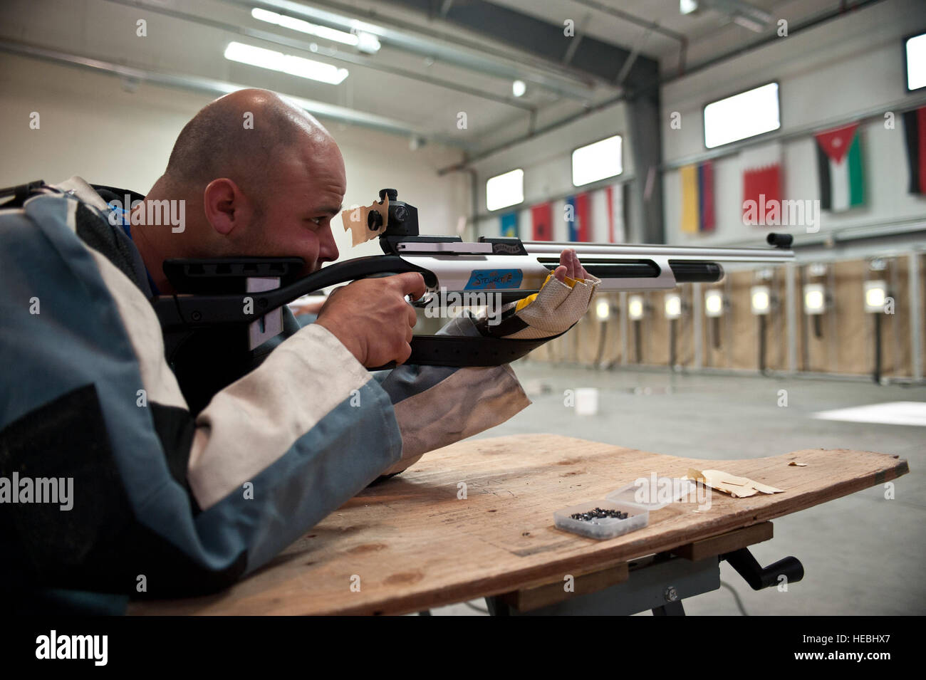 Edward Newbern, 2015 U.S. Air Force Trials participant, aims at a ...
