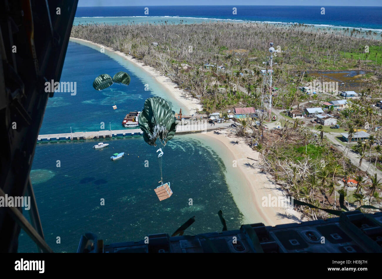 Cargo drops from a U.S. Air Force C-130 Hercules aircraft over the ...