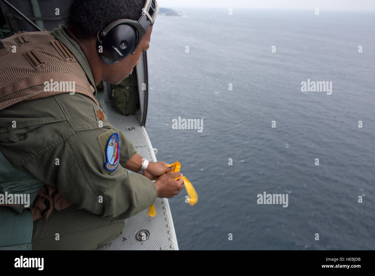 An air mobility liaison officer marks a drop zone in Sagami Bay using ...