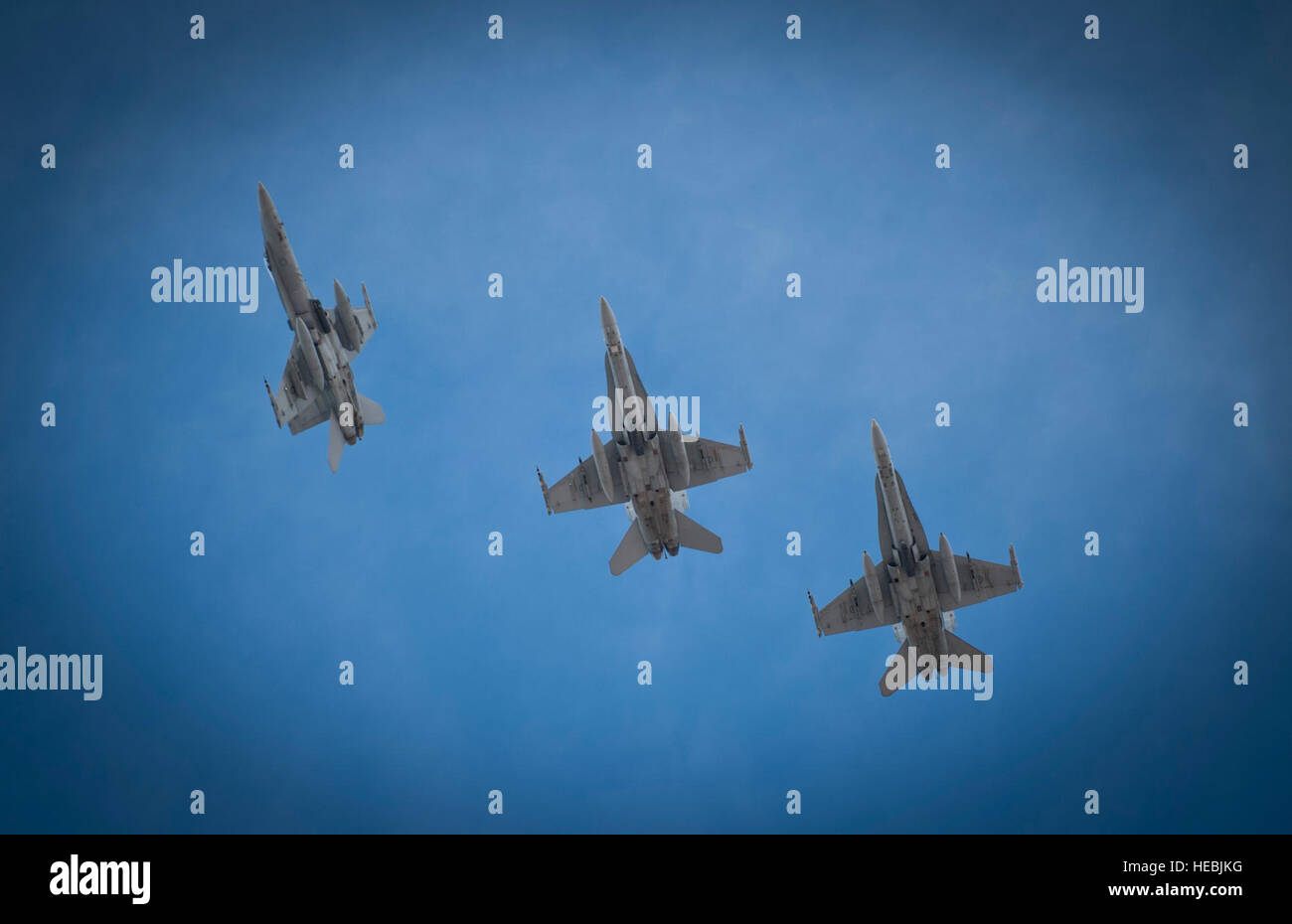 Three Royal Australian Air Force F/A-18 Hornets assigned to No. 77 ...