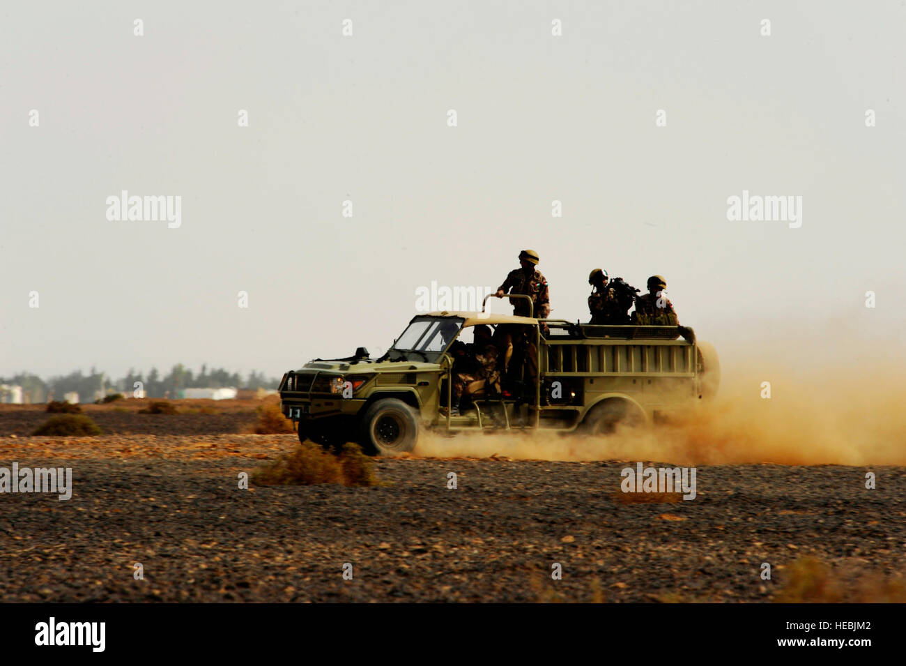 Royal Jordanian special operations soldiers drive to their target house ...