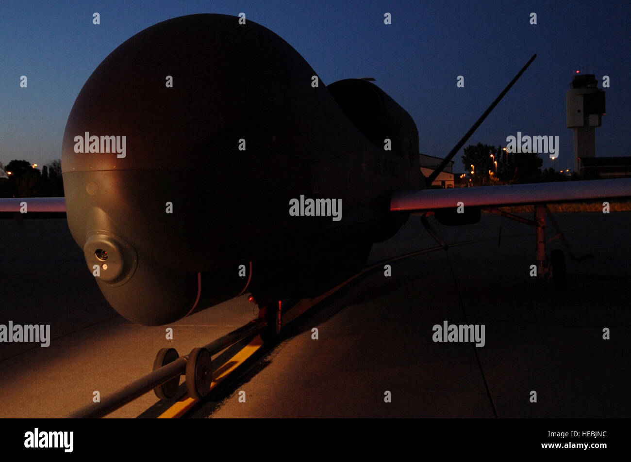 A RQ-4 Global Hawk is moved on the flight line on Grand Forks Air Force ...