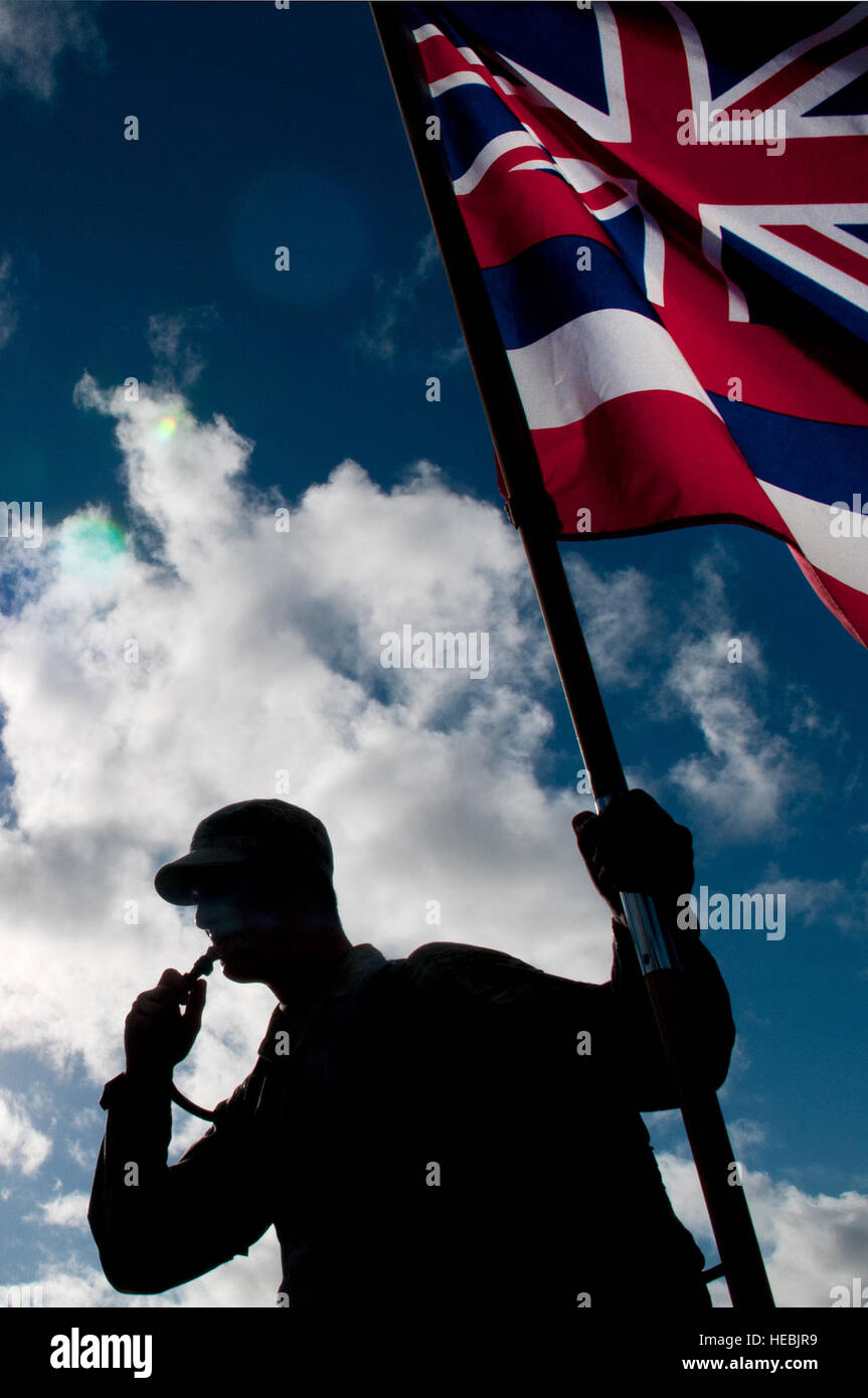 Senior Airman Mose Matila, 154th Security Forces Squadron, drinks from ...