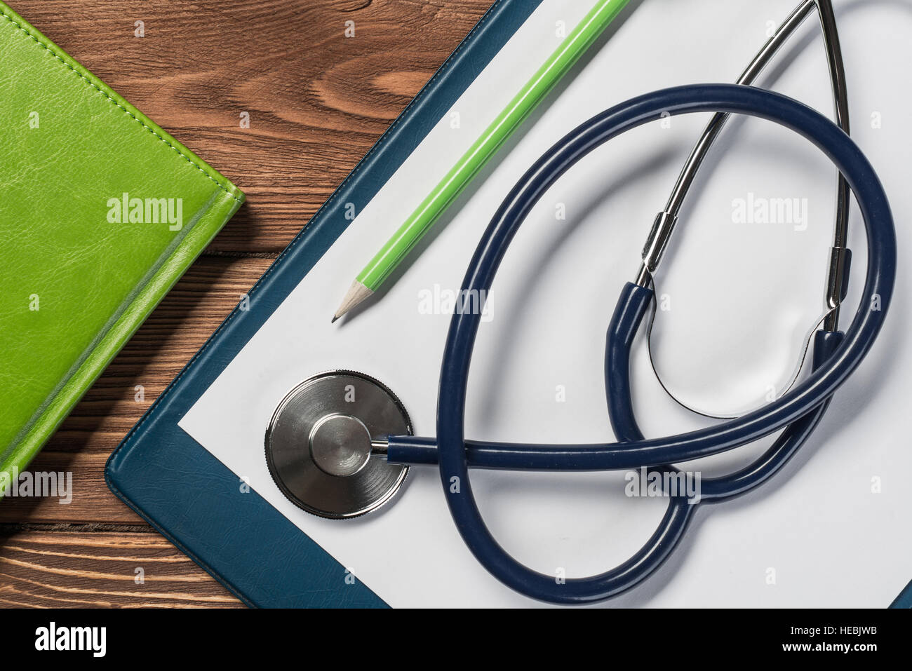 Desk of doctor with medicine things Stock Photo - Alamy