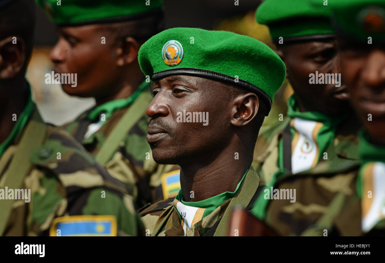 Rwandan soldiers stand in formation awaiting orders after being dropped ...