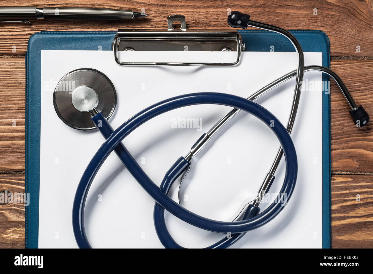 Desk of doctor with medicine things Stock Photo - Alamy