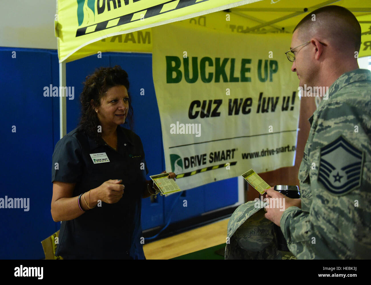 A Drive Smart Colorado team member discusses seat belt safety with ...
