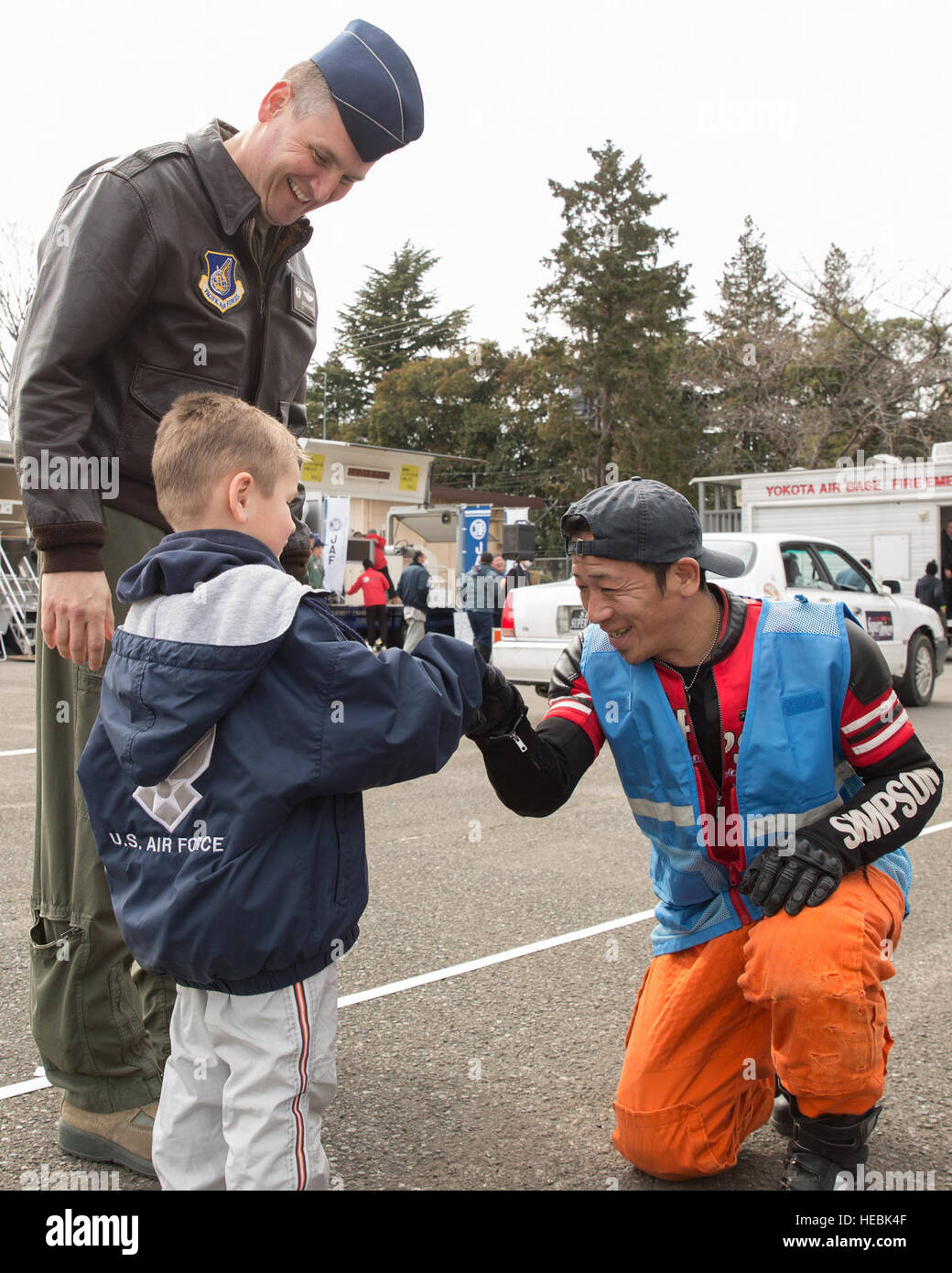 Col. Douglas DeLaMater, 374th Airlift Wing commander, and his son ...