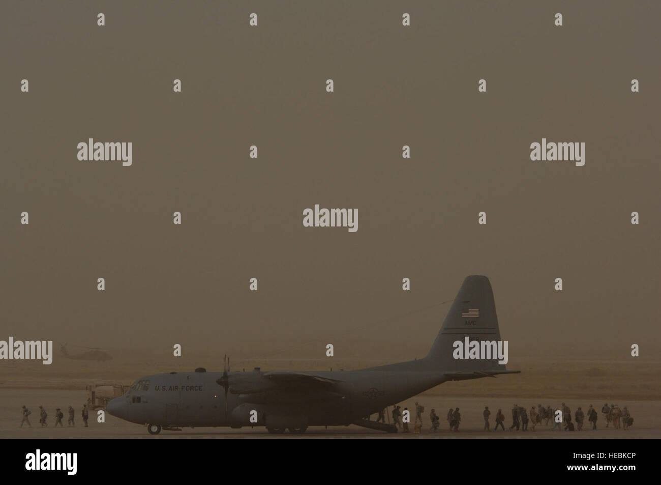 Personnel supporting Operation Iraqi Freedom load on to a C-130 ...