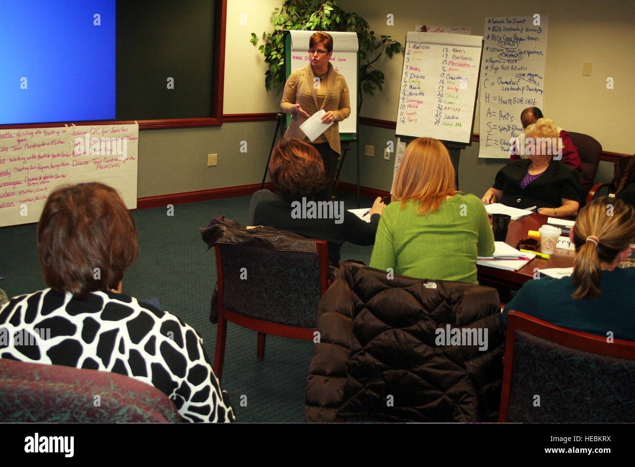 Kristy Grove, standing, a youth coordinator at Dover Air Force Base ...