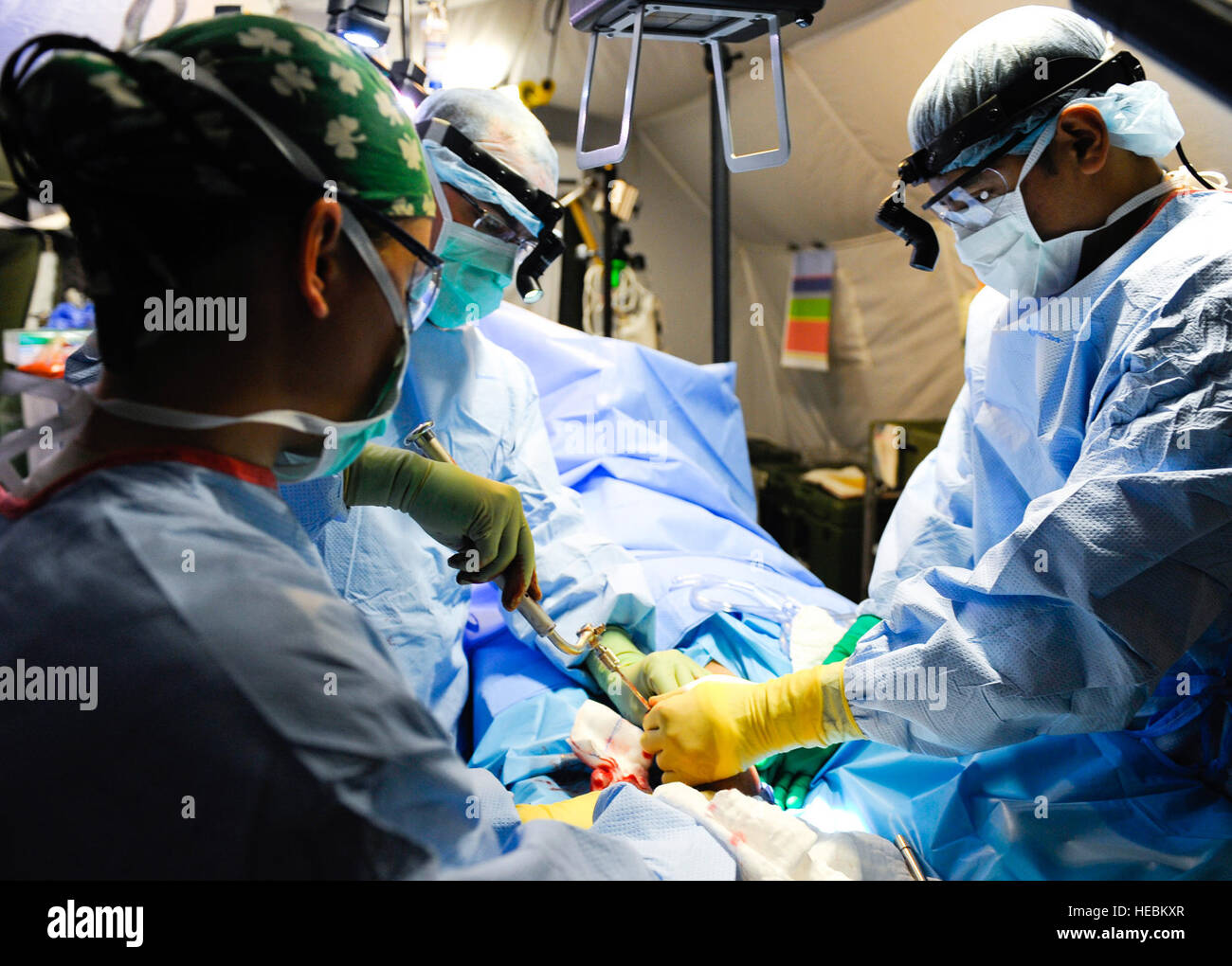 Members of the 541st Forward Surgical Team perform surgery on a five ...