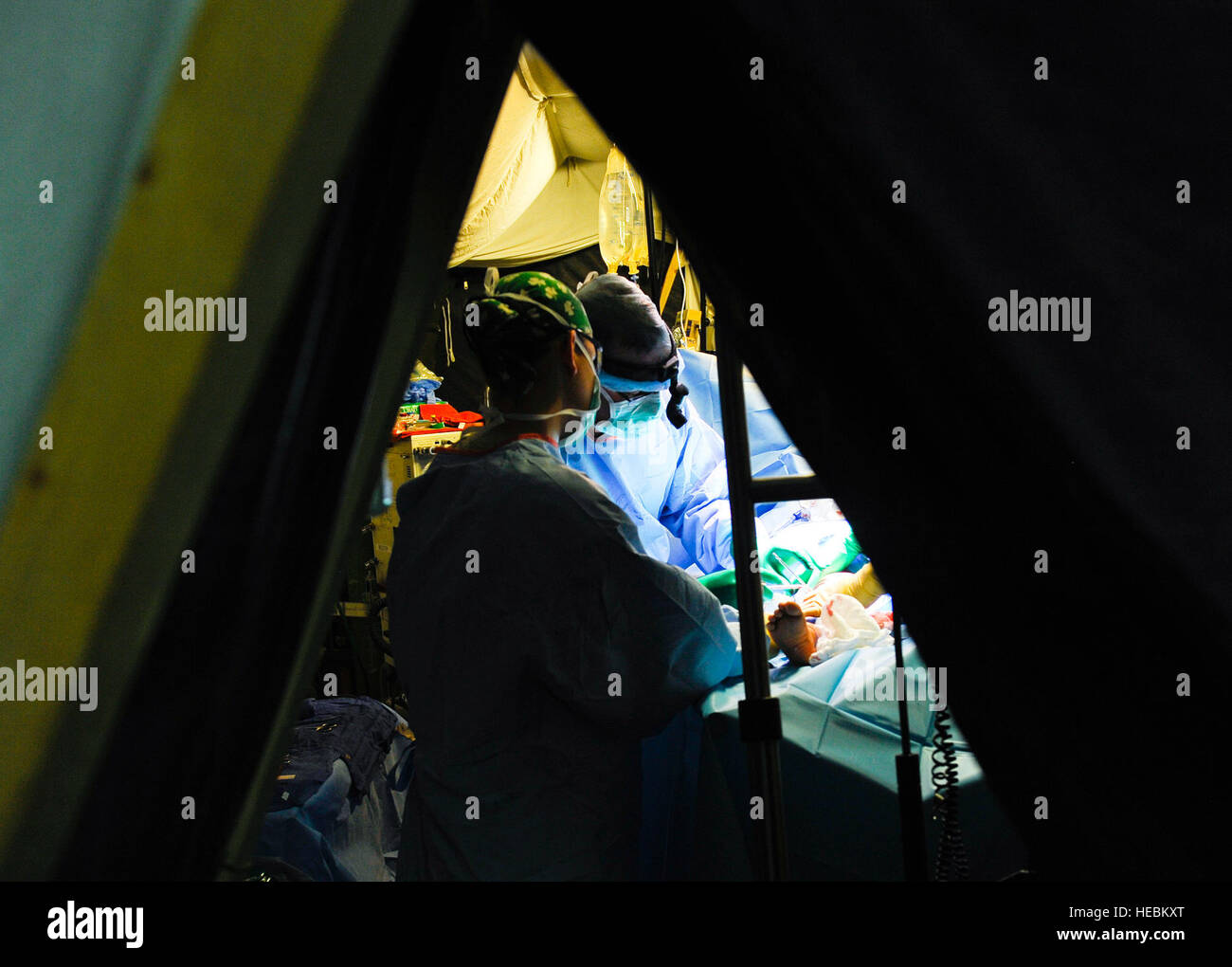 Members of the 541st Forward Surgical Team perform surgery on a five ...