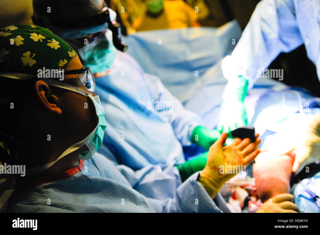 Members of the 541st Forward Surgical Team perform surgery on a five ...