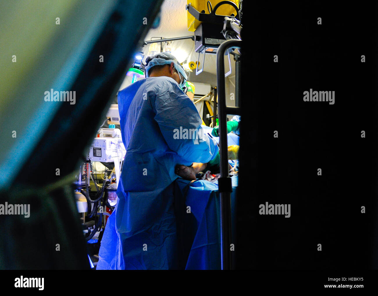 Members of the 541st Forward Surgical Team perform surgery on a five ...