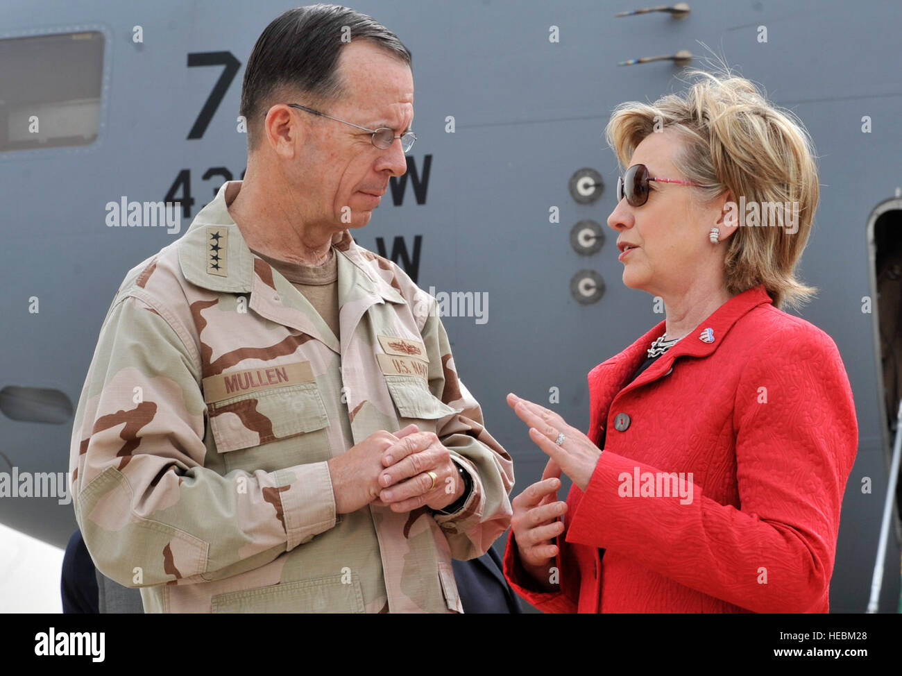 Secretary of State Hillary Clinton talks with Navy Adm. Mike Mullen ...