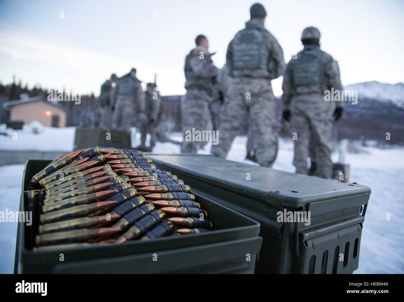 Strips of 7.62x51mm ball ammunition are staged for M240B machine gun ...
