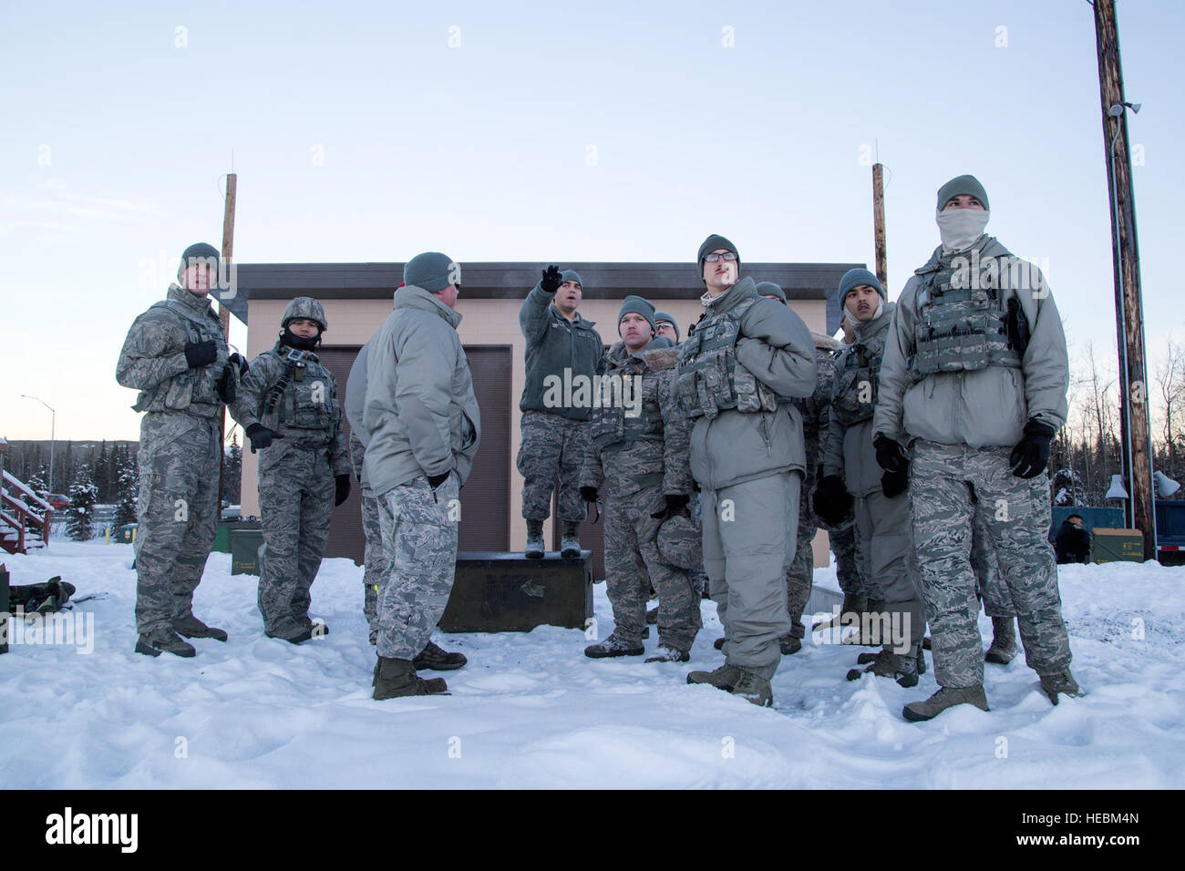 U.S. Air Force Tech. Sgt. David Jensen, center, a combat arms ...