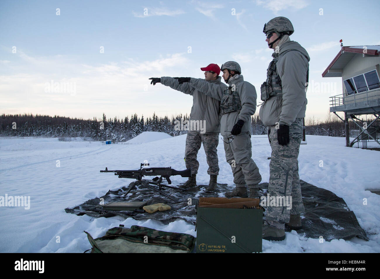 U.S. Air Force Staff Sgt. Ruben Salazar, left, a combat arms instructor ...