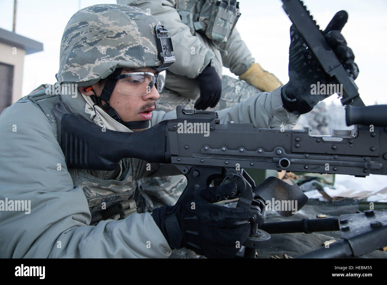 An Airman from the 673rd Security Forces Squadron performs live fire ...