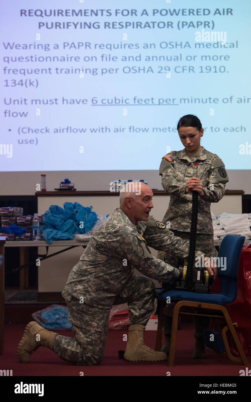 U.S. Army Lt. Col. Neal Woollen (left), United States Army Medical ...