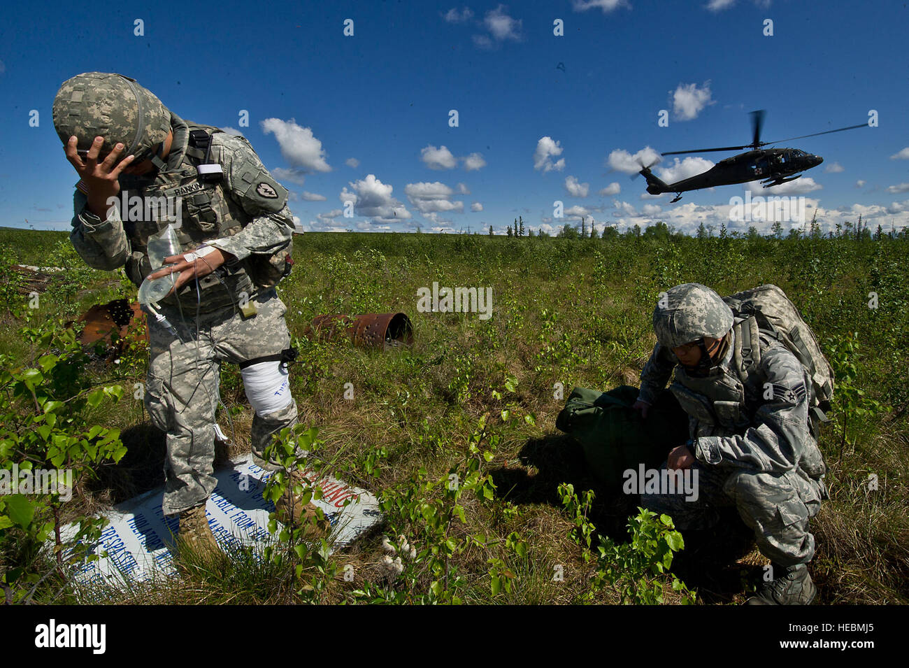 U.S. Army and Air Force personnel conduct a casualty evacuation ...