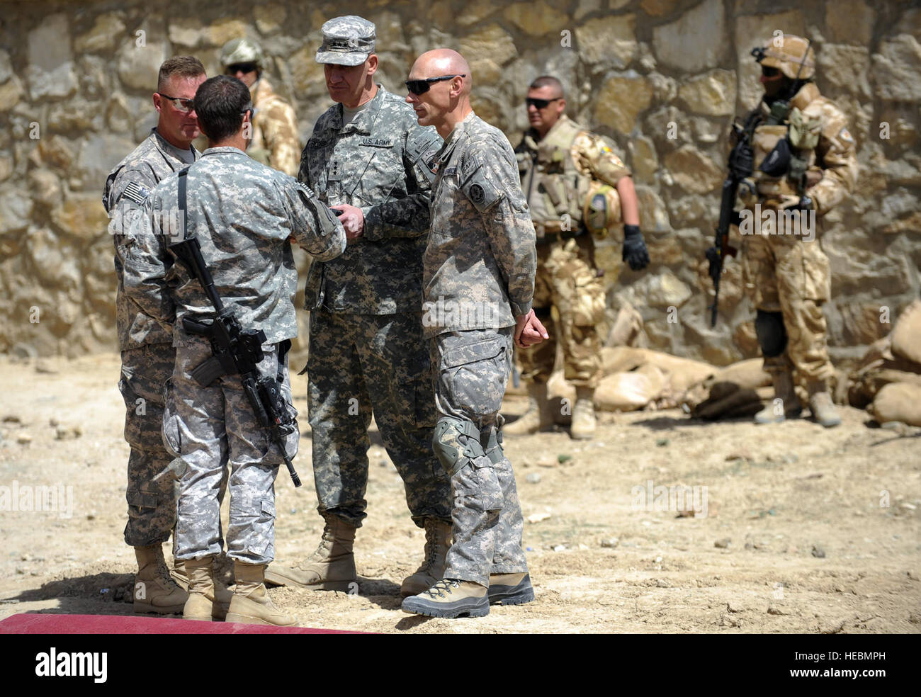 Lt. Gen. David M. Rodriguez, center, talks with unit commanders during ...